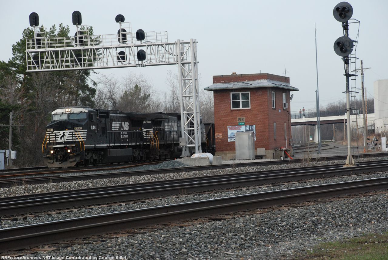NS 8461 takes a very short 2 car train west.
